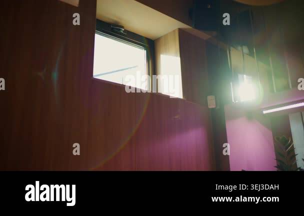 Interior shot of a modern cafe or restaurant corner with warm wooden ...
