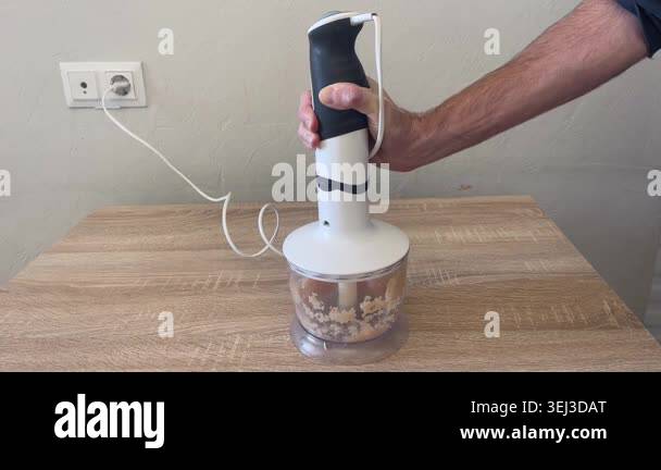 food mixer whirring and grinding in bowl Stock Video Footage - Alamy
