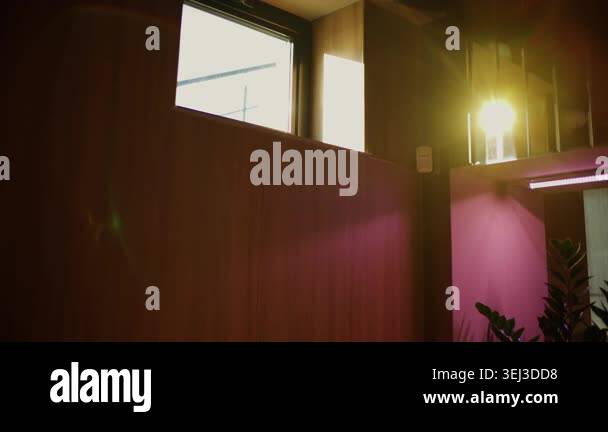 Interior shot of a modern cafe or restaurant corner with warm wooden ...