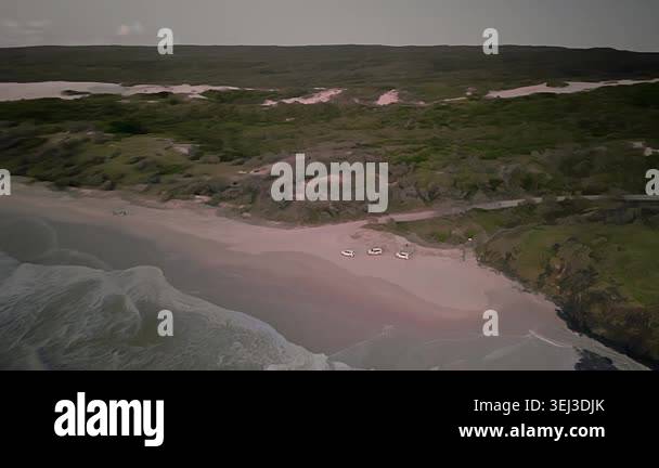 Aerial drone shot of beach tracks at sunrise on Fraser Island. High ...