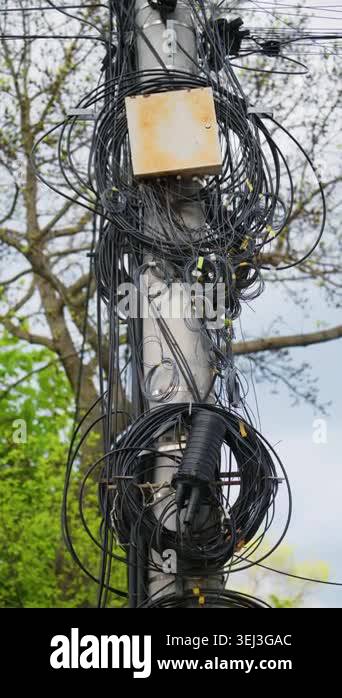 Close up of tangled cables and wires on a utility pole Stock Video ...