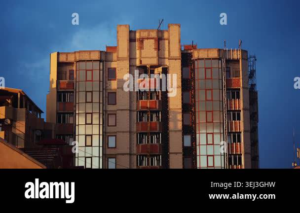 Mid rise residential apartment building under construction with exposed ...