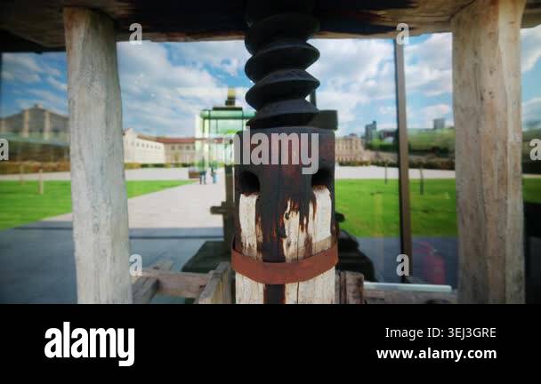 Close up of a traditional wooden wine press displayed at winery castle ...