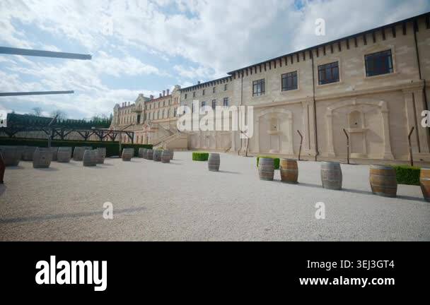 Wide courtyard view at winery castle in Moldova, showing historic ...