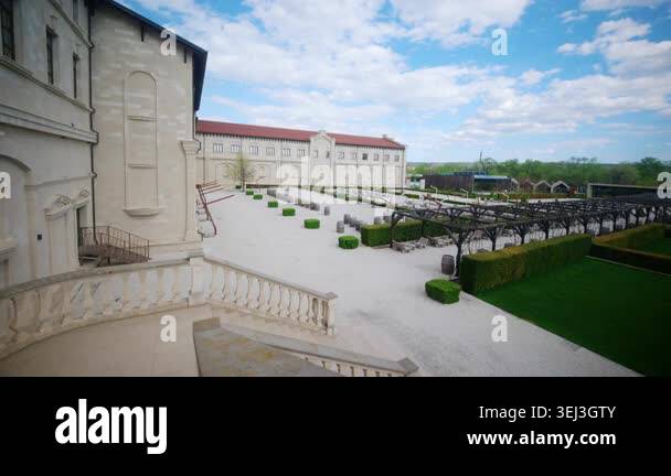 Wide panoramic view of wineryin Moldova, showing the elegant courtyard ...