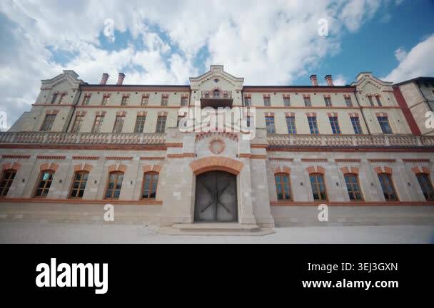 Wide frontal view of winery castle in Moldova, featuring the grand ...