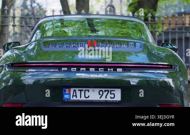 Chisinau, Moldova - April 17, 2026: Rear view of a luxury green Porsche ...