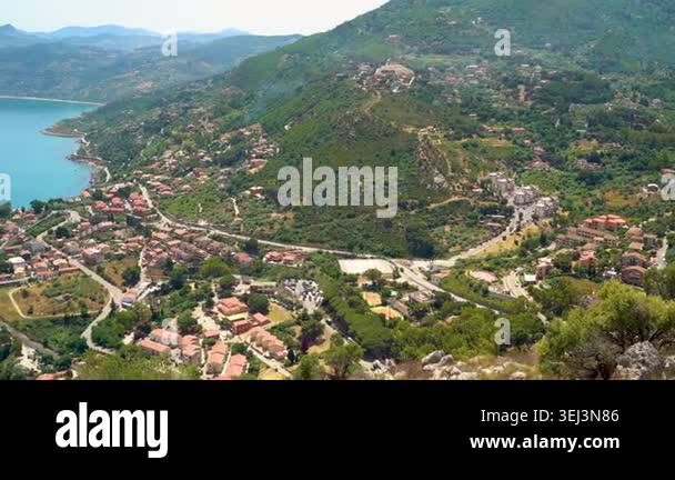 Panoramic aerial view of Taormina hillside roads with cypress trees ...