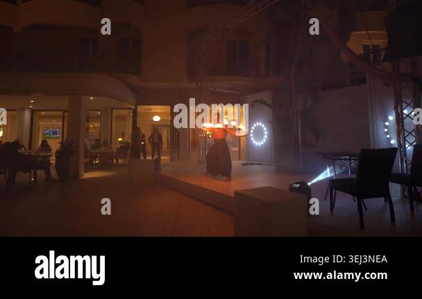 4K video of an enchanting Sicilian courtyard at night with warm ...