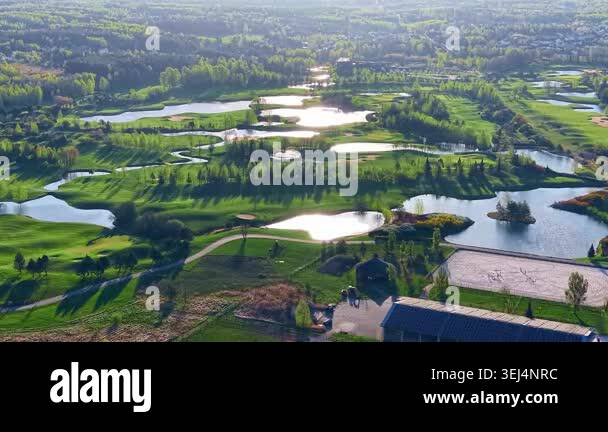Summer golf course with ponds and green grass Stock Video Footage - Alamy
