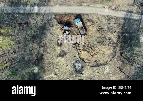 Earthworks happening in a rural forested area Stock Video Footage - Alamy