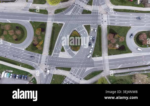 Modern city crossroads with cars and pedestrian crossings Stock Video ...