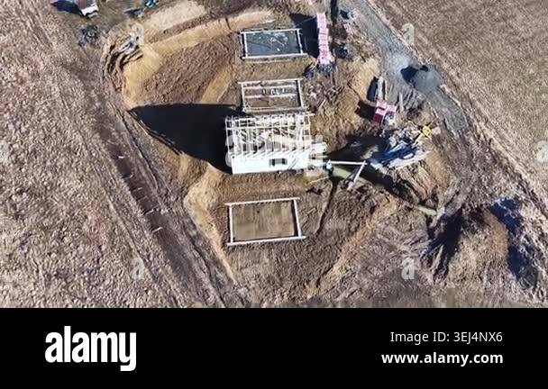 House building progress with timber roof and concrete walls Stock Video ...