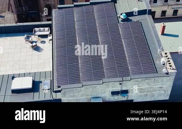Sustainable rooftop design with solar panels and patio Stock Video ...