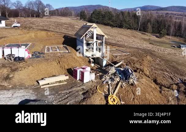 House under construction with wooden roof frame and scaffolding Stock ...