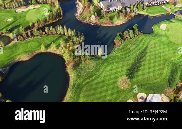 Aerial view of golf green with sand bunkers Stock Video Footage - Alamy