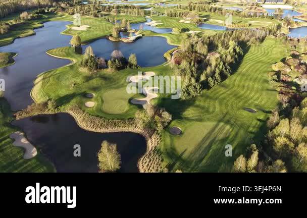 Drone's eye view of a stunning golf landscape Stock Video Footage - Alamy