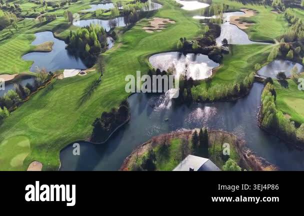 Golf course landscape with green grass and sand traps Stock Video ...