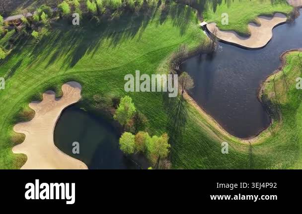 Top view of golf course green and bunkers Stock Video Footage - Alamy
