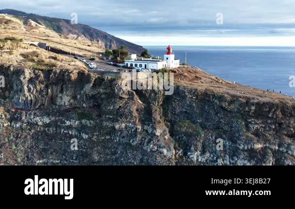 Ponta do Pargo Lighthouse stands on towering cliffs overlooking the ...
