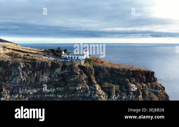 Ponta do Pargo Lighthouse on rugged cliffs overlooks the Atlantic Ocean ...