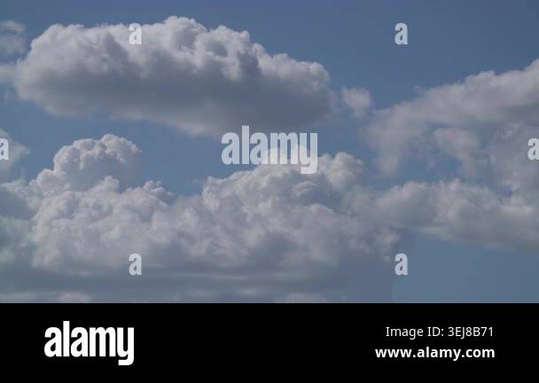 High-quality 4K resolution time-lapse video of fluffy white cumulus ...
