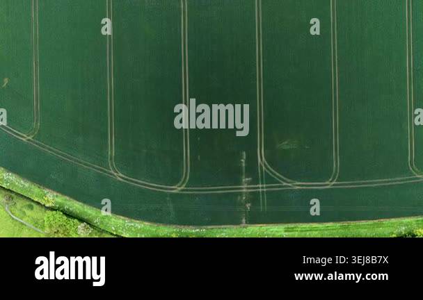 Aerial drone footage of green agricultural crop fields near Selby in ...