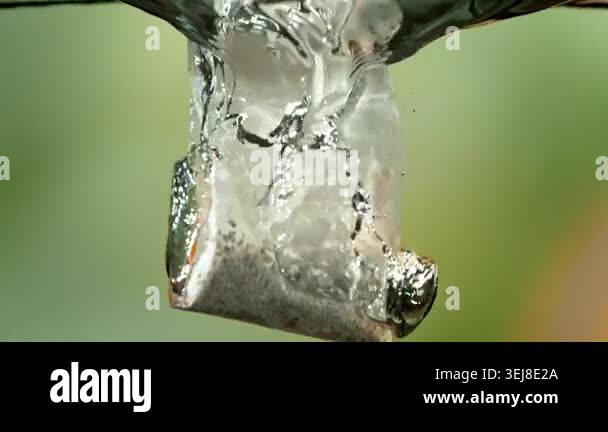 Super Slow Motion of Falling and Extracting Tea Bag into Hot Water at ...