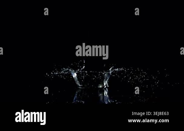 Super Slow Motion Shot of Water Crown Splash Isolated on Black ...