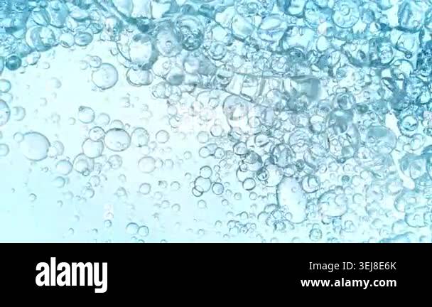 Super Slow Motion Shot of Oil Bubbles Floating in Water at 1000fps ...