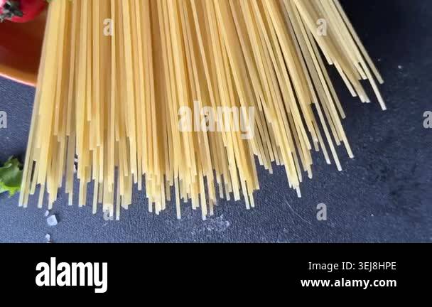 Spaghetti raw durum wheat food preparation lunch or dinner tasty snack ...