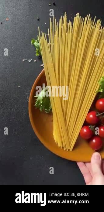 Spaghetti raw durum wheat food preparation lunch or dinner tasty snack ...