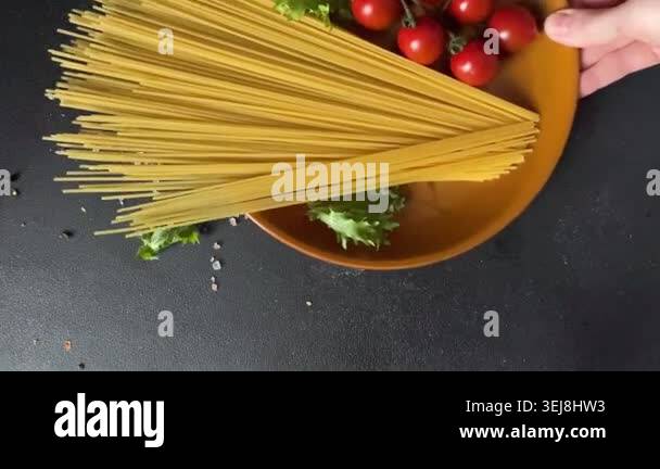 Spaghetti raw durum wheat food preparation lunch or dinner tasty snack ...