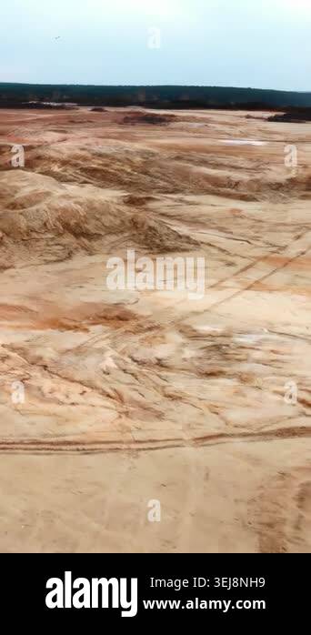 Aerial View Sunlit Sandy Plain Showing Reflective Pools And Winding ...
