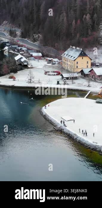 Frozen Lakeside Peninsula With Snowcovered Lawn And Winding Walkway ...