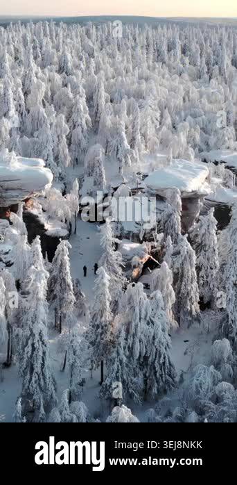 Aerial Frozen Ridge Overlook With Layered Ice Shelves And SnowLaden ...
