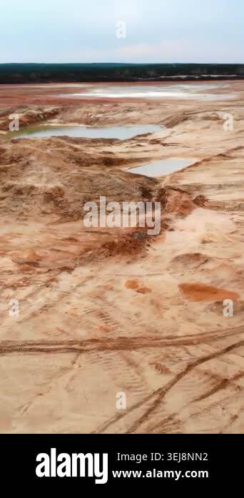 Aerial View Sunlit Sandy Plain Showing Reflective Pools And Winding ...