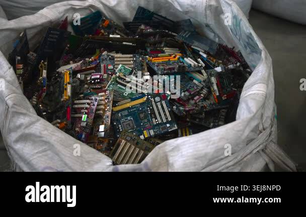 Sack Filled With Motherboards And Circuits, Piled Inside Heavy Woven ...