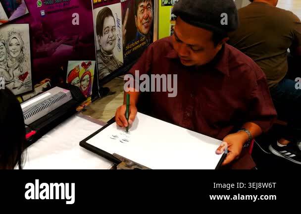 MALAYSIA, Nilai - February 1, 2019 Family portrait caricature sketch by ...
