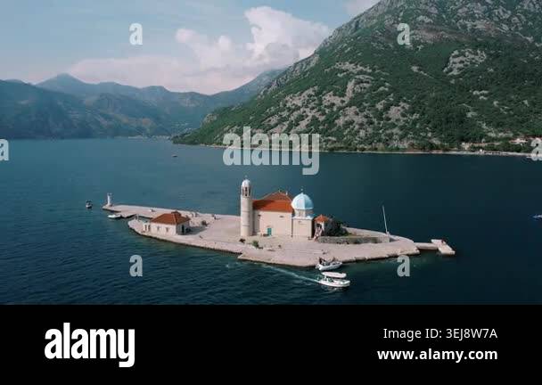 Drone approach chapel landing pier, tender docking and passengers ...