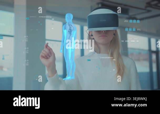 Woman in vr headset manipulating holographic anatomy, modern lab space ...
