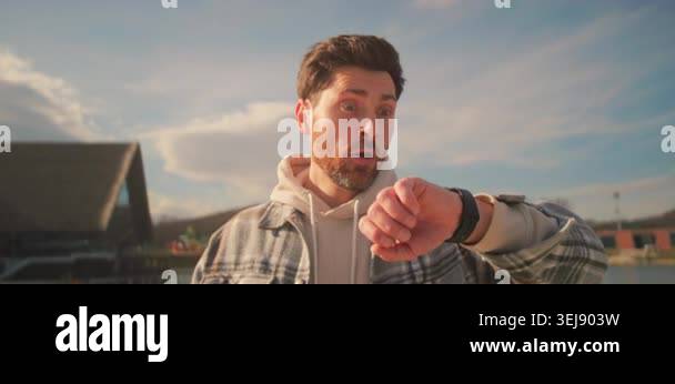 man by lake reacting with surprise and joy, expressive face and ...