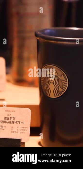 8 April 2025 Shanghai China: Black Starbucks cup in airport Starbucks ...