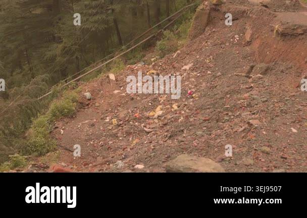 Landslide in mountains destroying road mud flow disaster aftermath ...