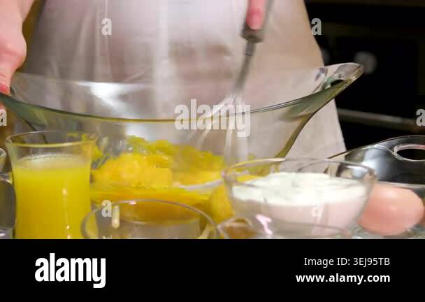 hands woman in white dress knead butter dough, adding sugar honey sour ...