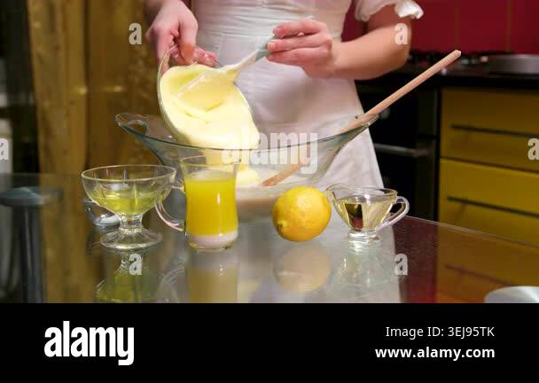 hands woman in white dress knead butter dough, adding sugar honey sour ...