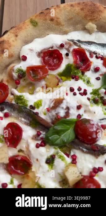 Tightframe burrata pizza with roasted cherry tomatoes and anchovy ...