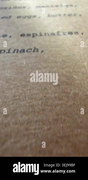 Closeup kraft paper menu text showing typewriter font, warm brown ...
