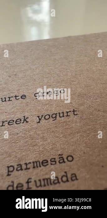 Closeup full menu spread on kraft paper showing FOOD header and ...