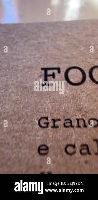 Closeup kraft menu header food bold typed letters show granola and ...